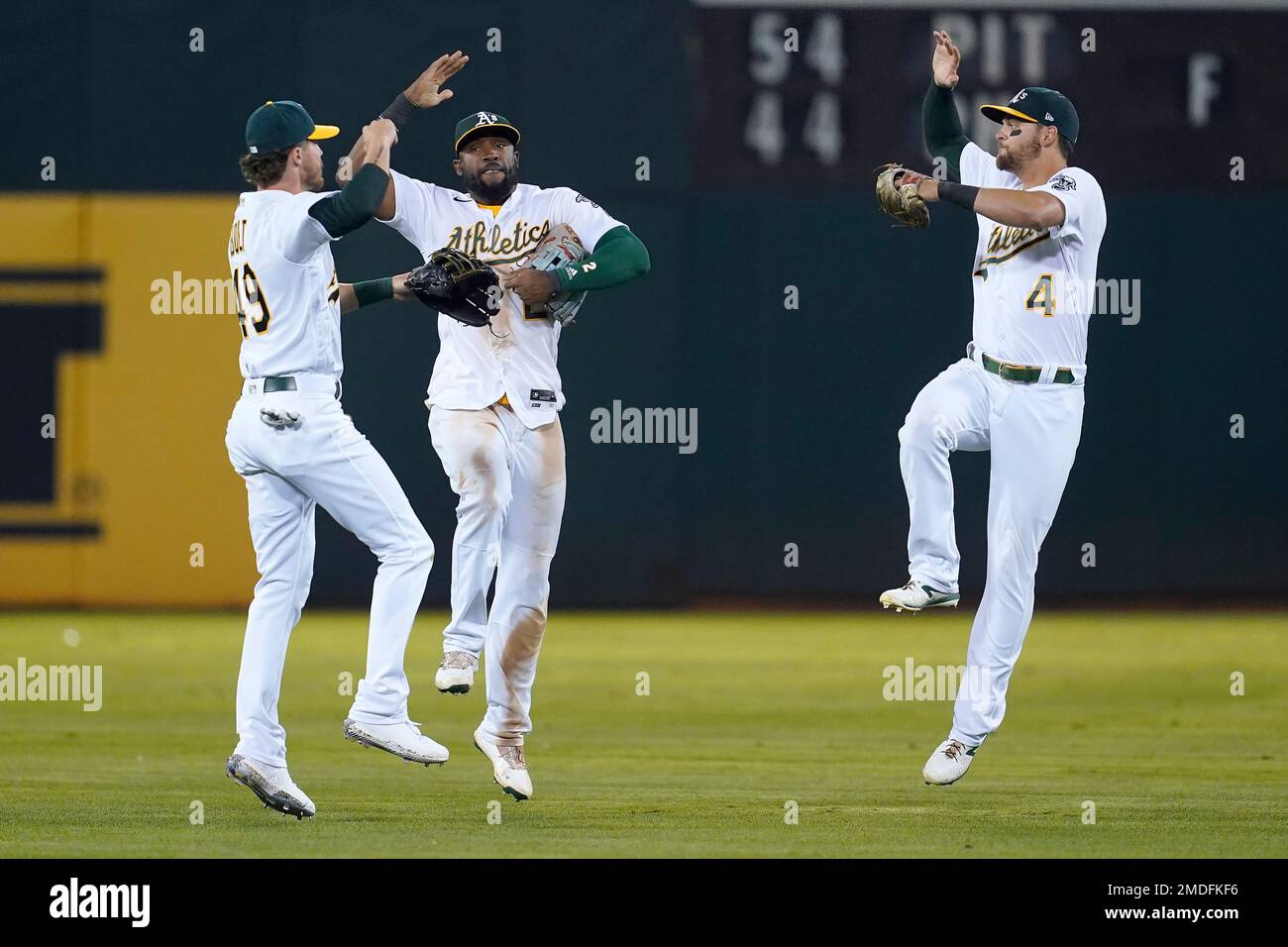 Oakland Athletics' Skye Bolt, from left, celebrates with Starling Marte ...