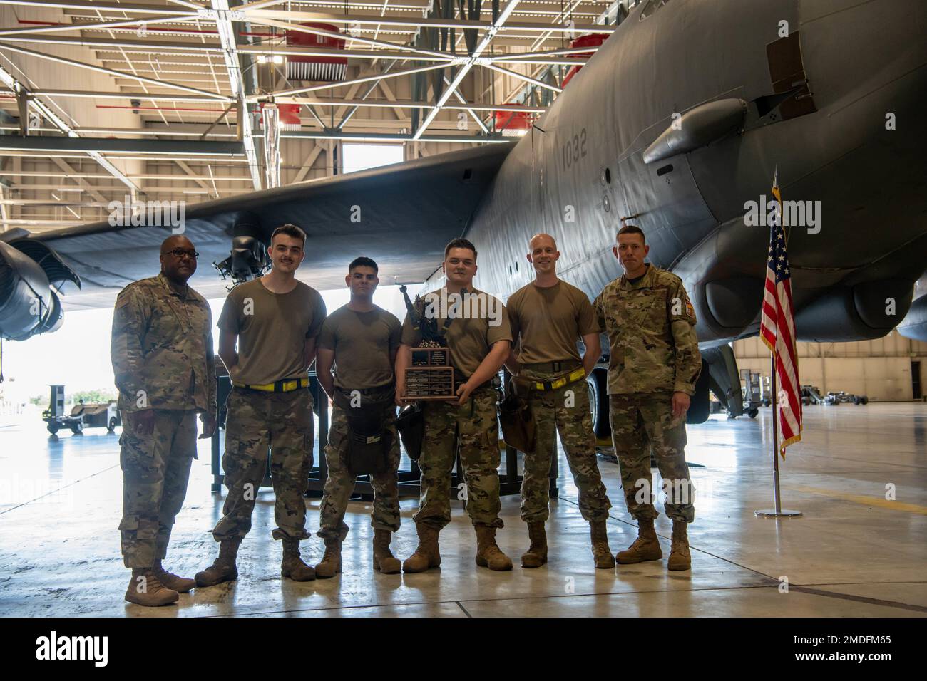 5th Aircraft Maintenance Squadron Weapons Load Crew team pose with a ...