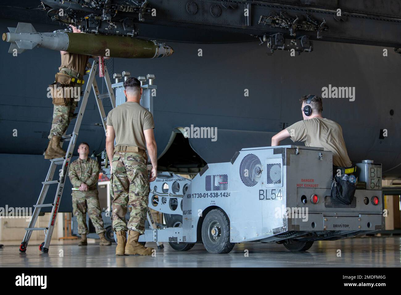 Weapons Load Crew Airmen from 5th Aircraft Maintenance Squadron compete ...