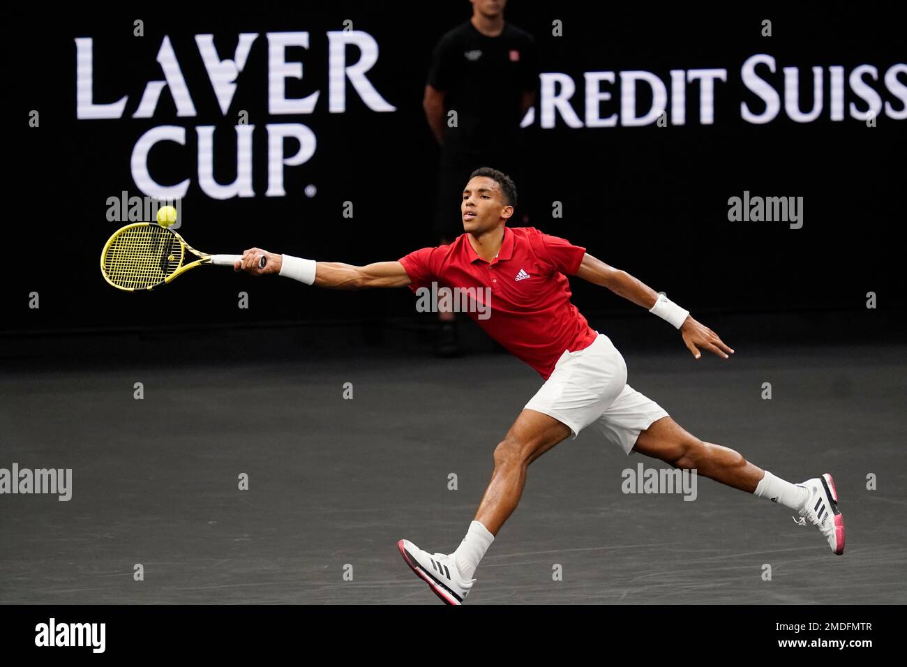 Team World's Felix Auger-Aliassime, of Canada, returns the ball to Team Europe's Matteo ...