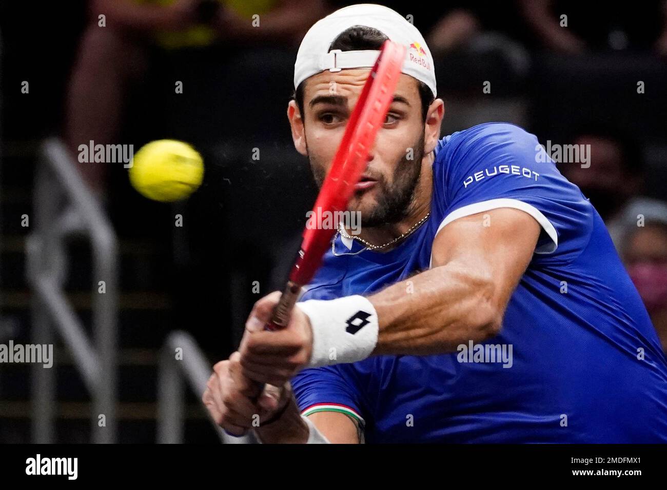 Team Europe's Matteo Berrettini, of Italy, returns the ball to Team ... Team Europe's Matteo Berrettini, of Italy, returns the ball to Team ...