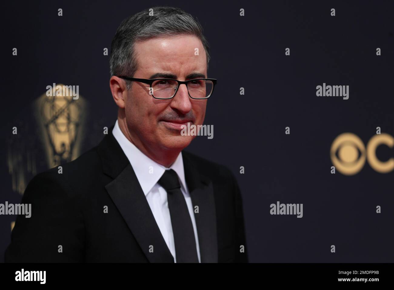 John Oliver arrives at the 73rd Emmy Awards at the JW Marriott on ...