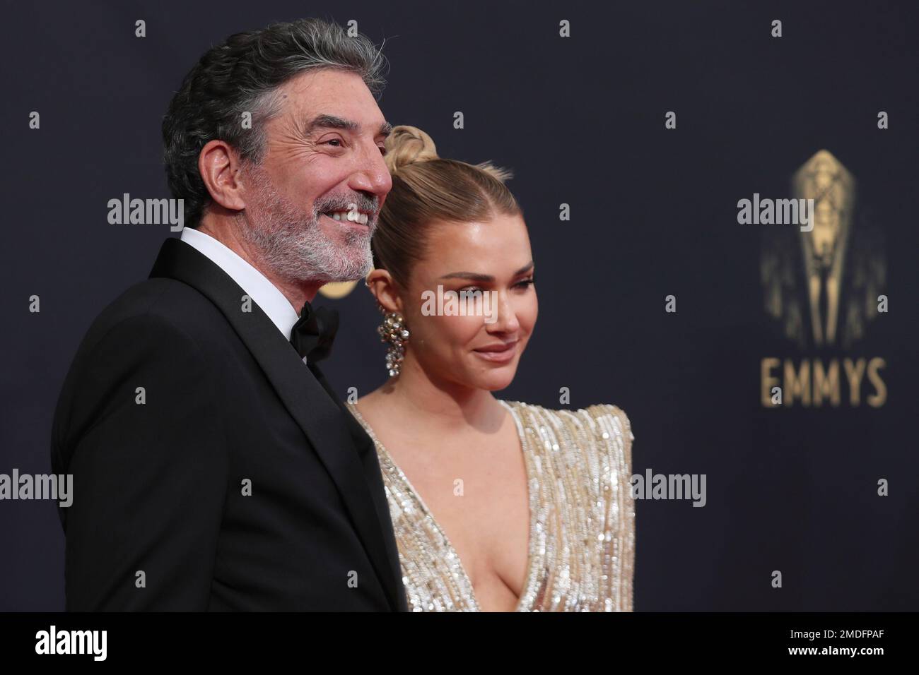 Chuck Lorre, left, and Arielle Lorre arrive at the 73rd Emmy Awards at ...