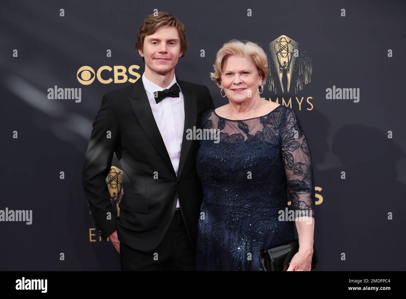 Evan Peters, left, and Julie Peters arrive at the 73rd Emmy Awards at ...
