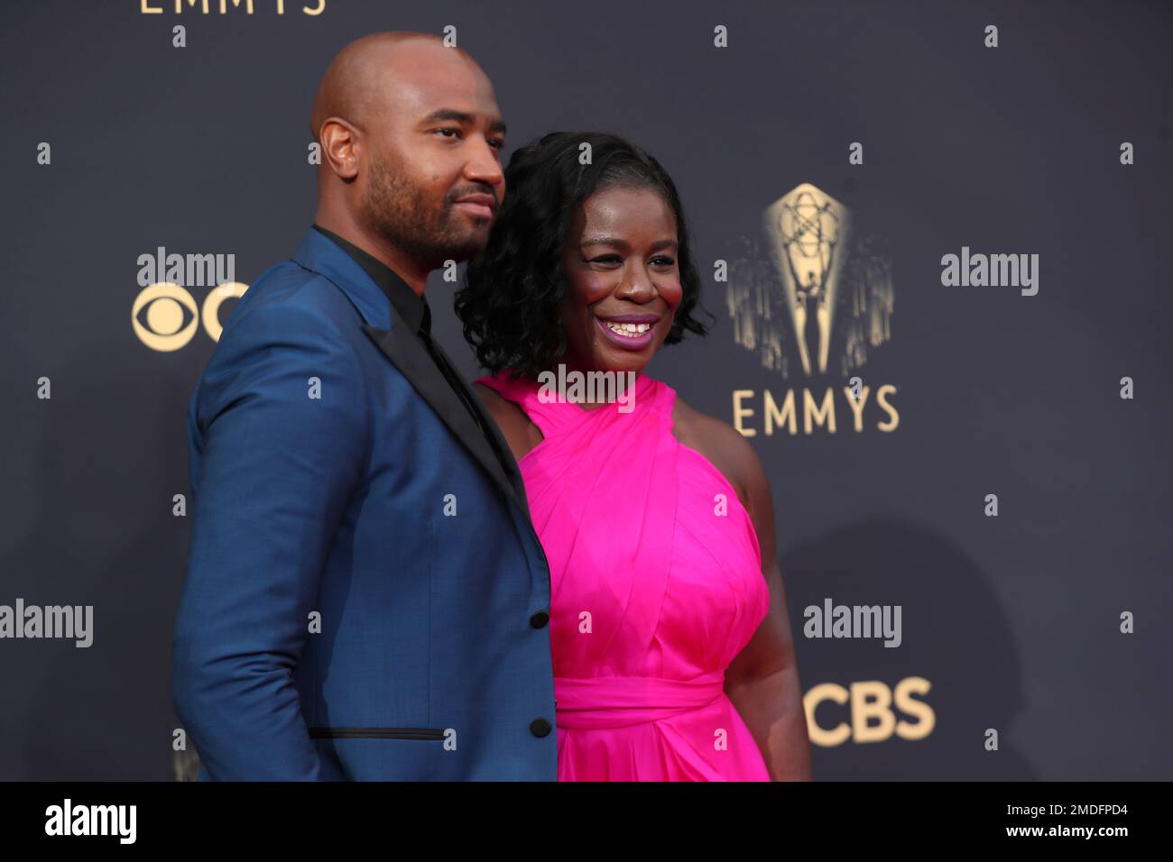 Robert Sweeting and Uzo Aduba arrive at the 73rd Emmy Awards at the JW ...