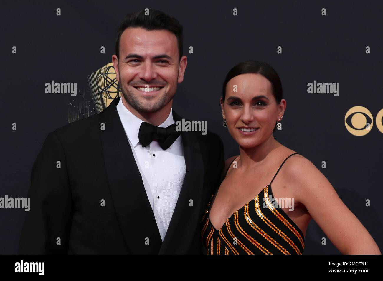 Ben Winston, left, and Meredith Winston arrives at the 73rd Emmy Awards at the JW Marriott on ...
