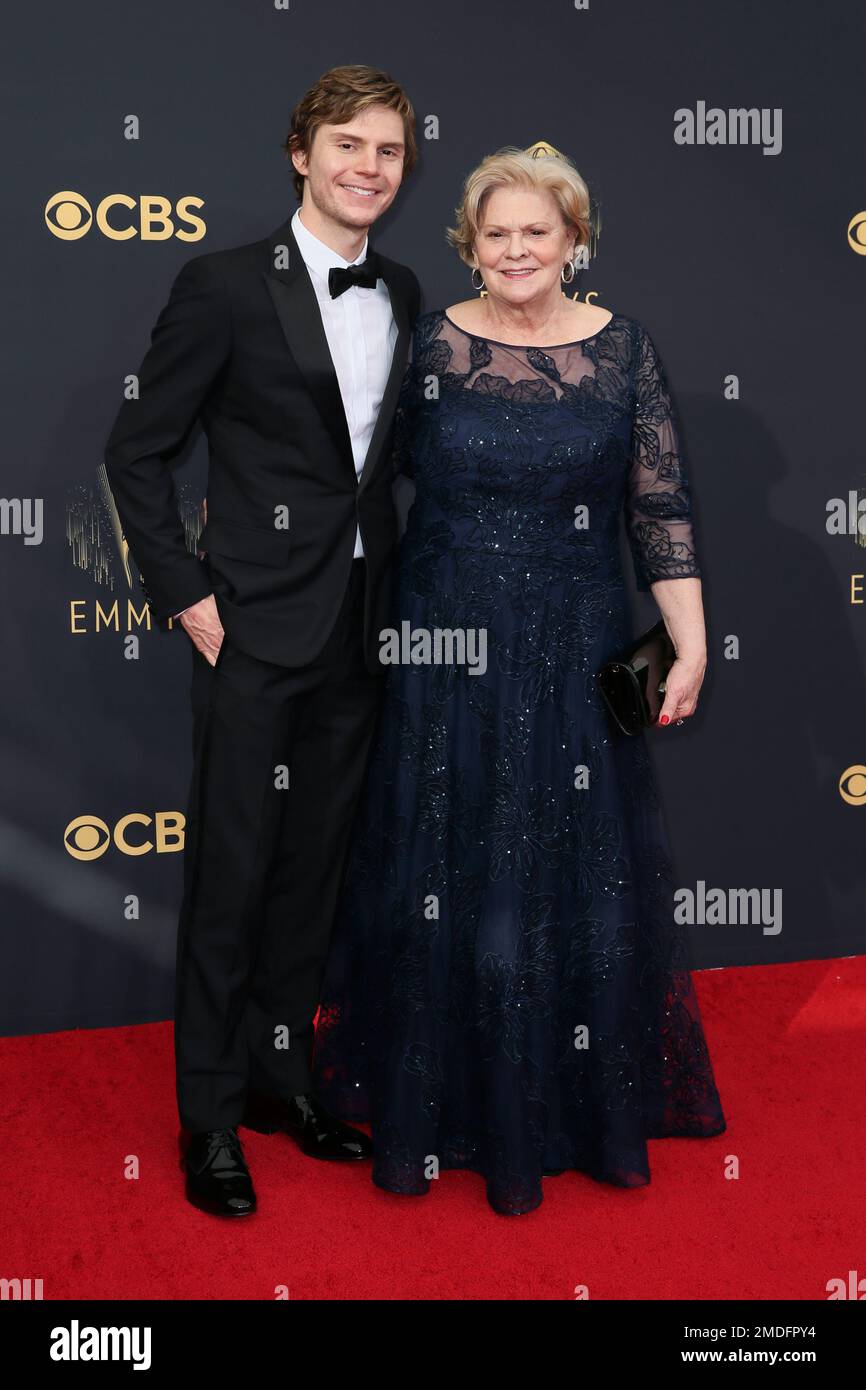 Evan Peters, left, and Julie Peters arrive at the 73rd Emmy Awards at ...
