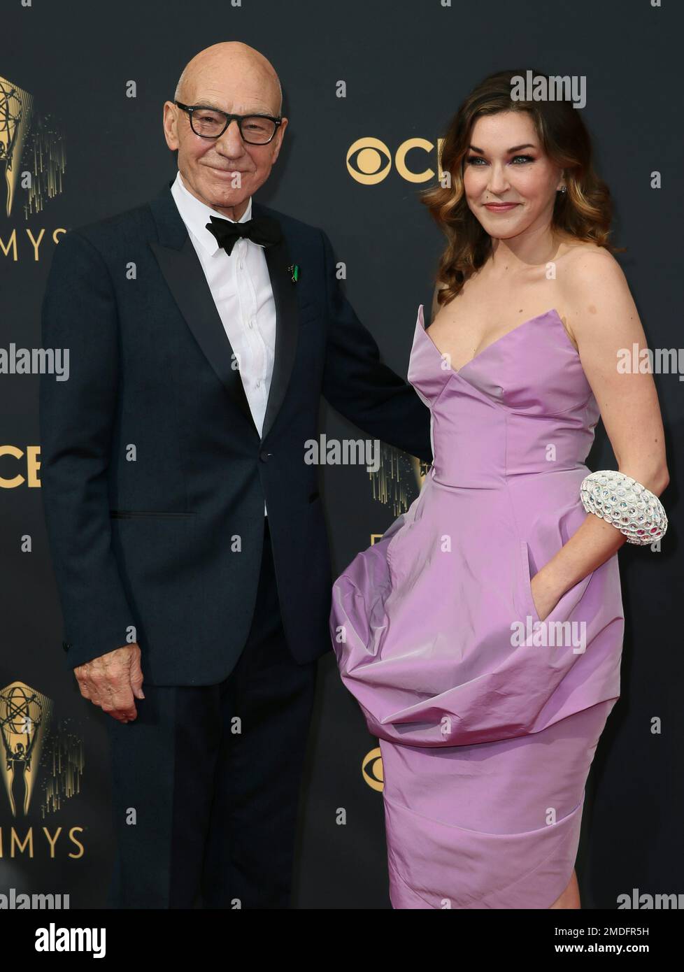 Patrick Stewart, left, and Sunny Ozell arrives at the 73rd Emmy Awards at the JW Marriott on ...