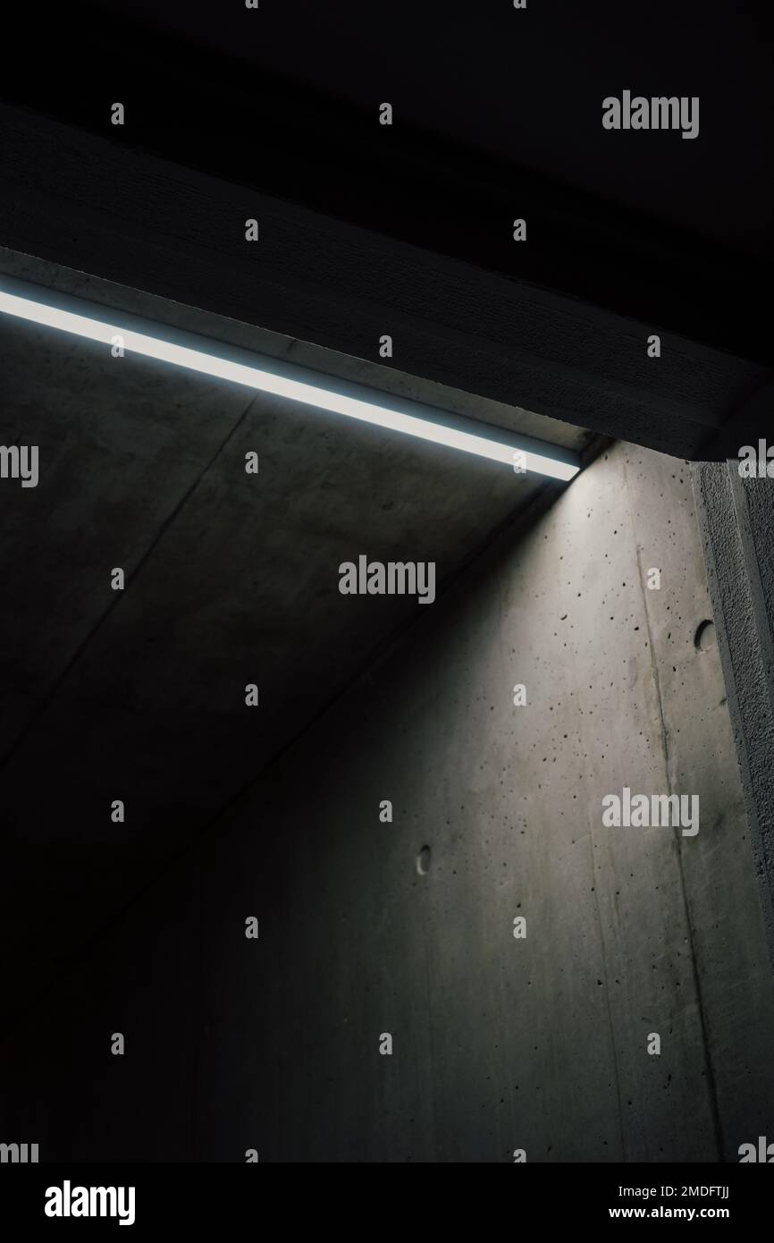 A vertical shot of a linear downlights in a tunnel Stock Photo - Alamy