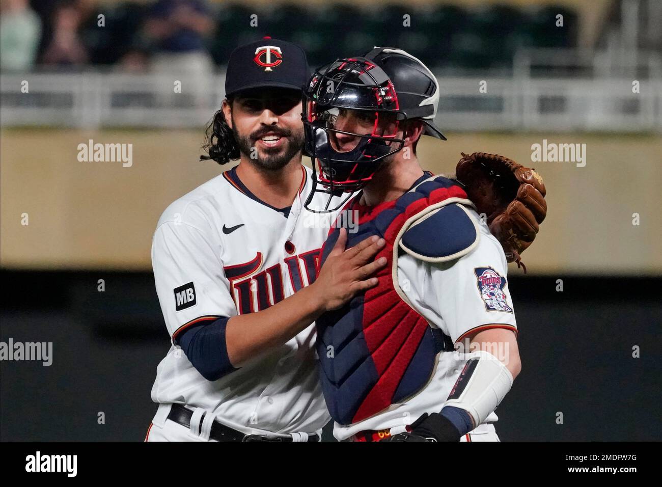 Minnesota Twins pitcher Ralph Garza Jr., left, and catcher Mitch Garver ...