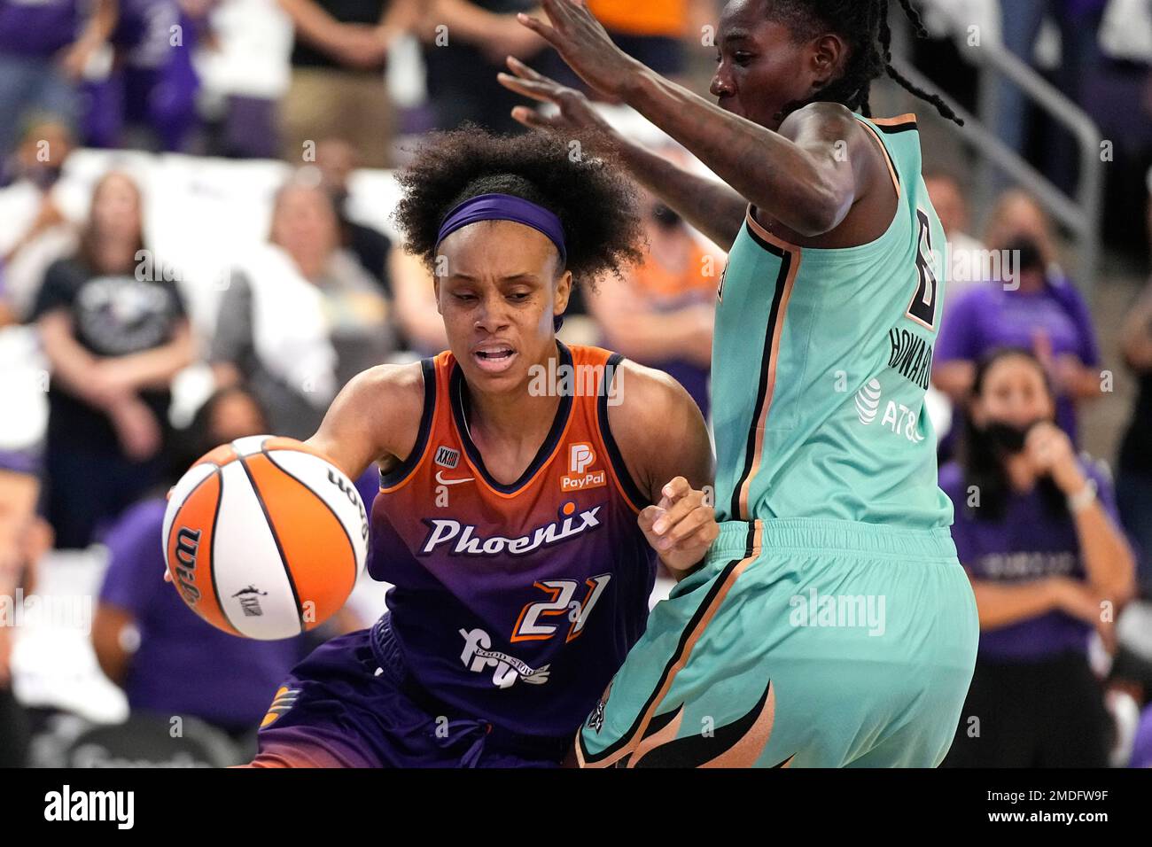 Phoenix Mercury forward Brianna Turner (21) drives past New York ...