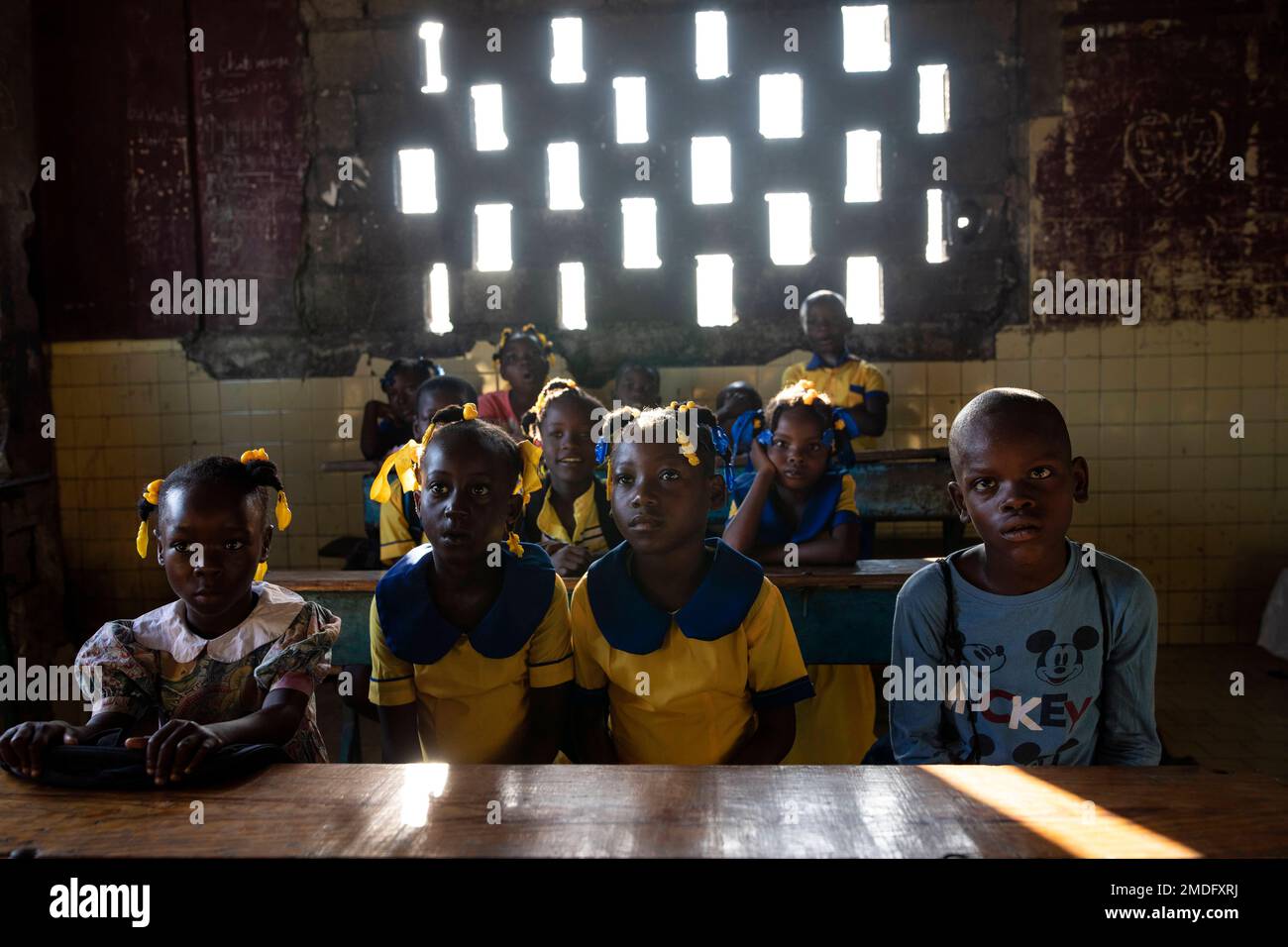 Students attend a class in Sante Bernadette school, inside Fort ...
