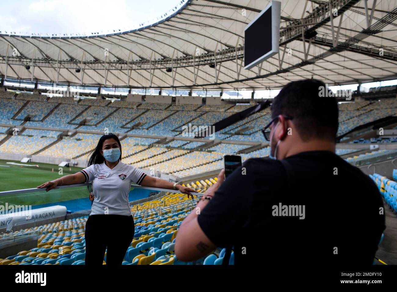 Visitors pose for photos during a tour of Maracana stadium in Rio de ...