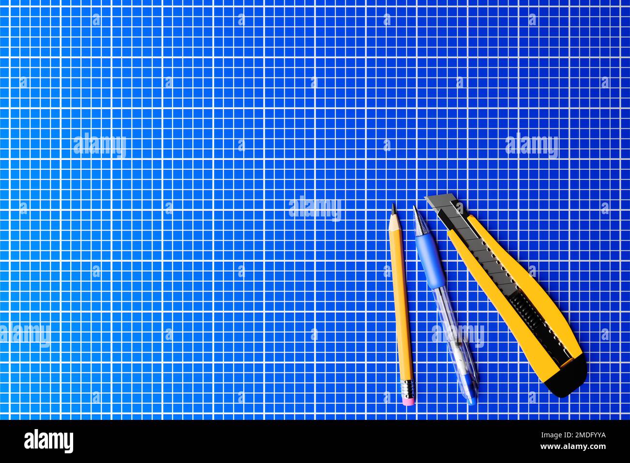 3D illustration of a cutter, pen and pencil in cartoon style on a blue ...