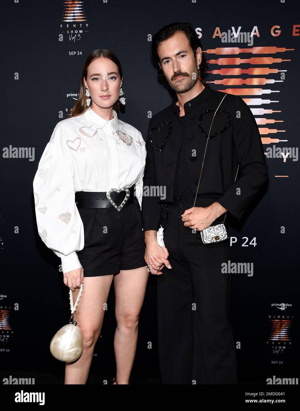 Isabelle Chaput, left, and Nelson Tiberghien aka Young Emperors attend ...