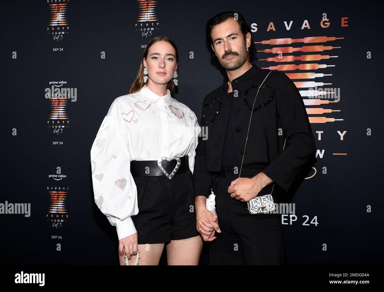 Isabelle Chaput, left, and Nelson Tiberghien aka Young Emperors attend ...