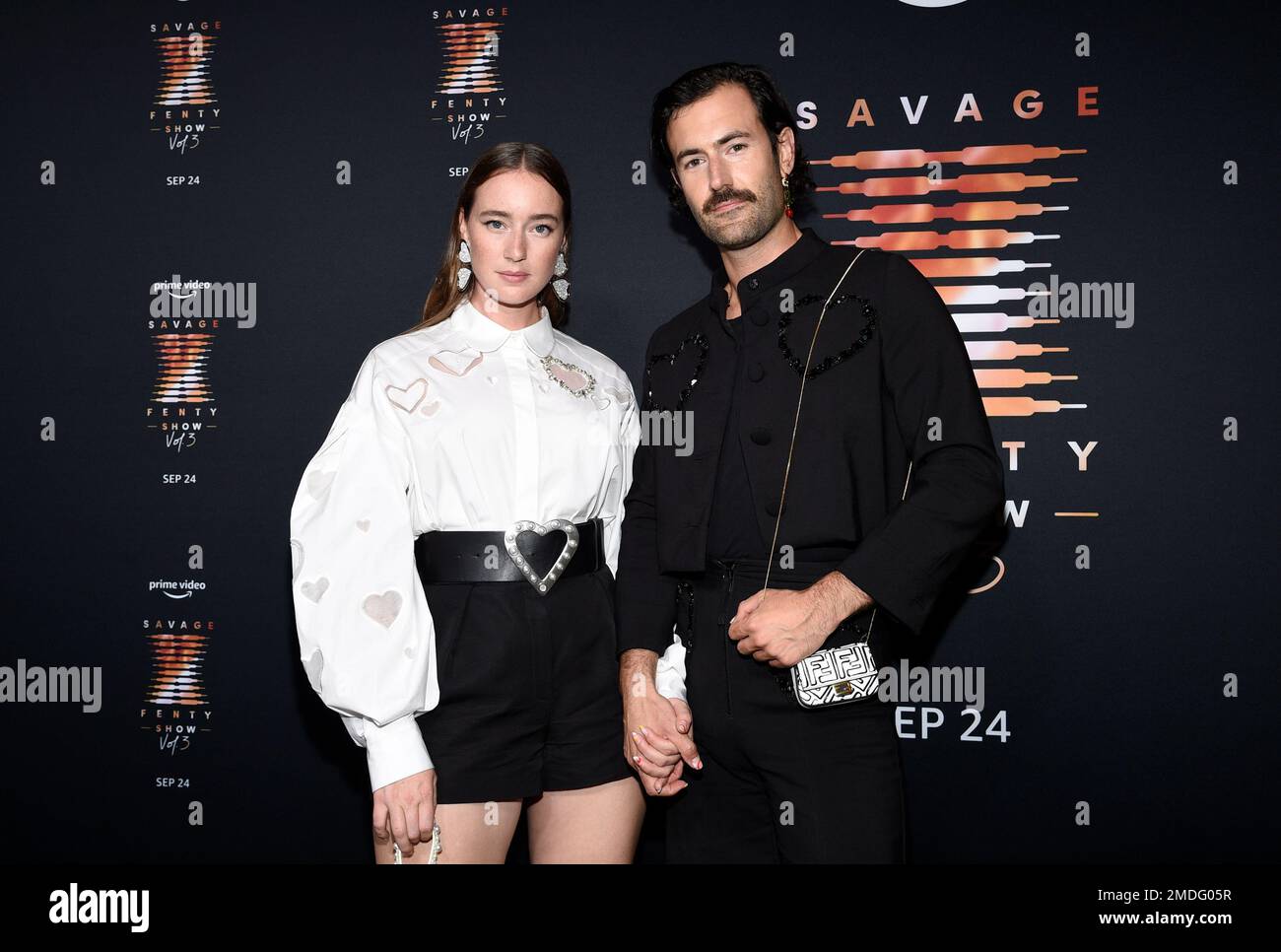 Isabelle Chaput, left, and Nelson Tiberghien aka Young Emperors attend ...