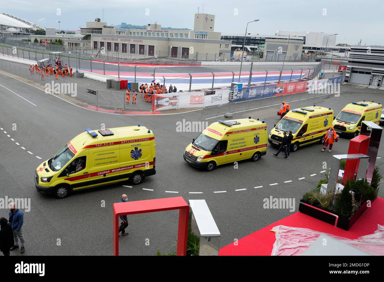 Ambulances move during a training at the Sochi Autodrom circuit, in ...