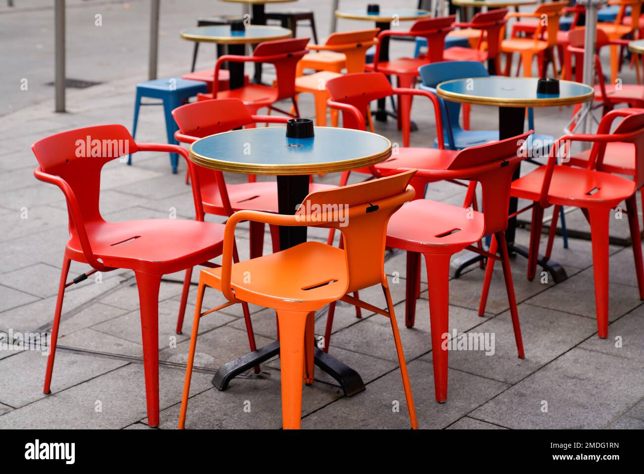 Charming red and orange chairs on cafe outdoor restaurant cafe and ...