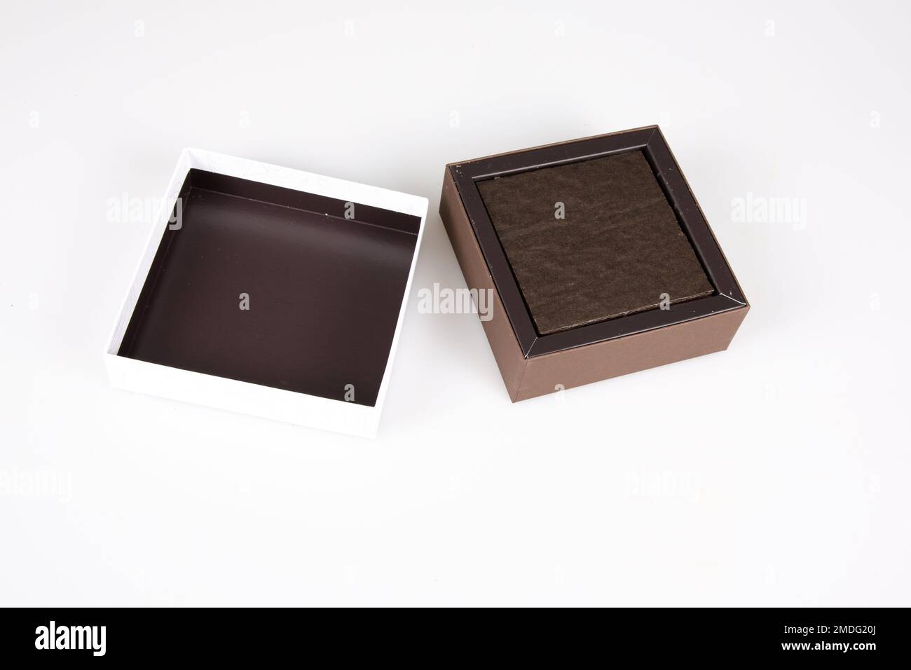 brown open Gift Box with cower in grey background Stock Photo - Alamy