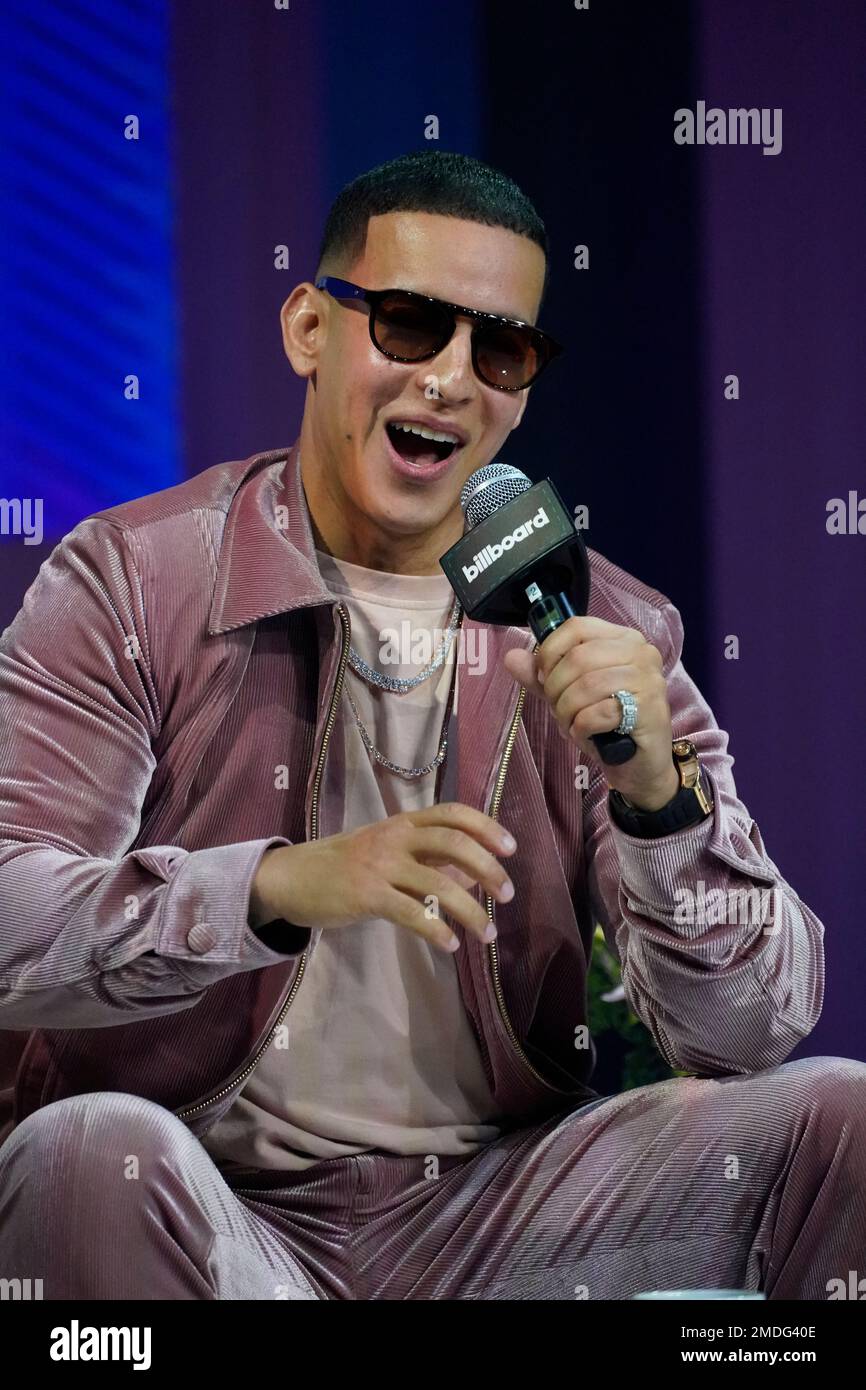 Puerto Rican singer Daddy Yankee speaks during a panel at Billboard ...