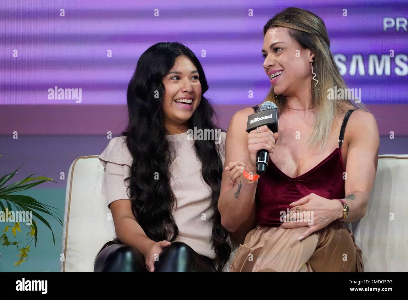 Singer Mabel, left, smiles at her mother Fernanda, during a Billboard ...