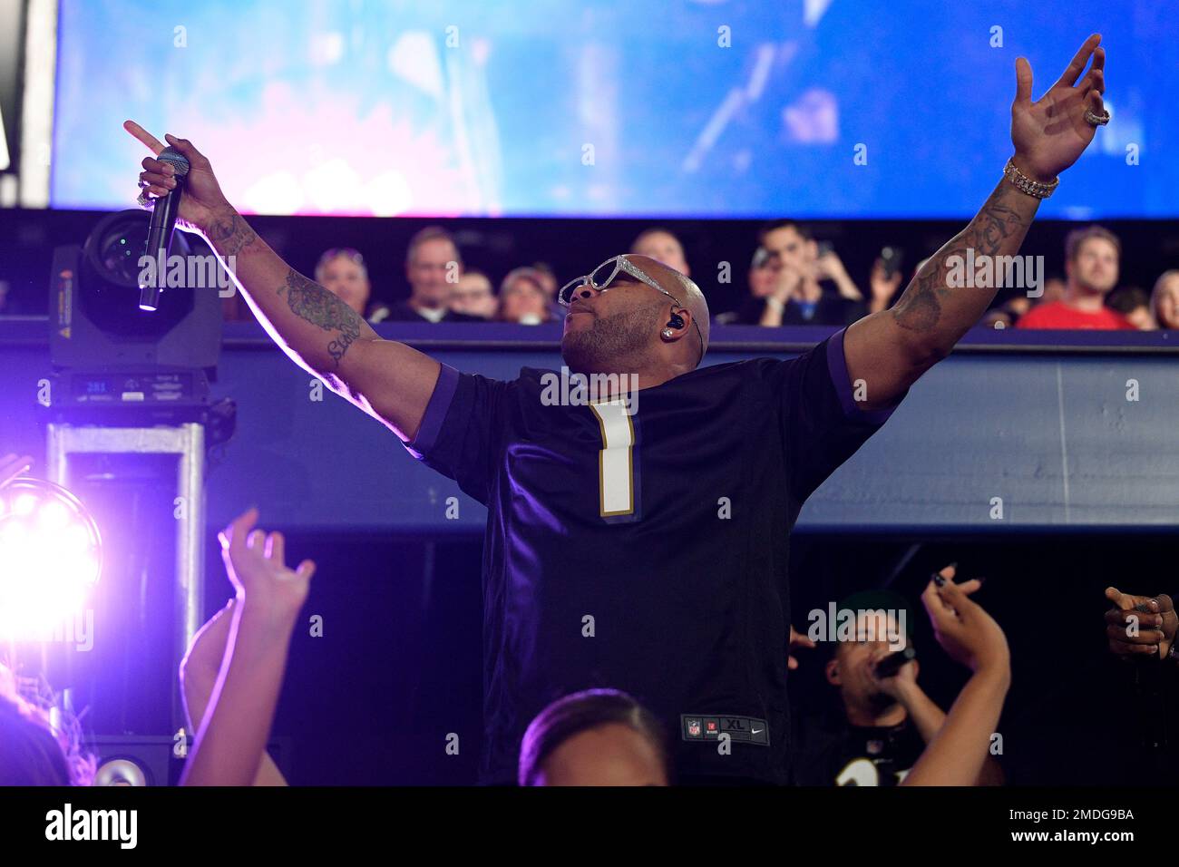 Flo Rida performs during halftime of an NFL football game between the ...