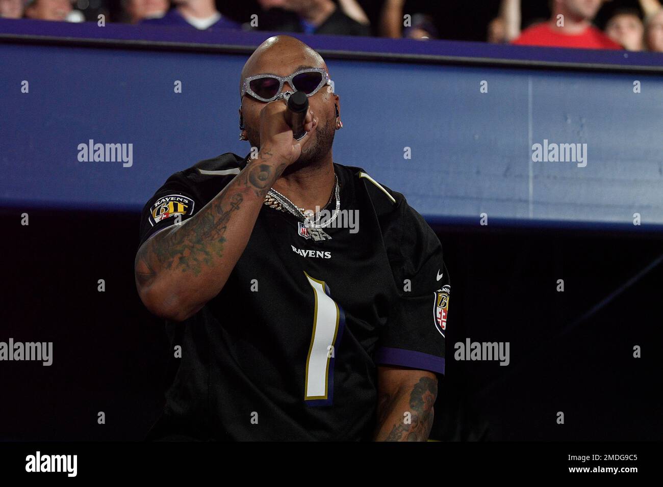 Flo Rida performs during halftime of an NFL football game between the ...