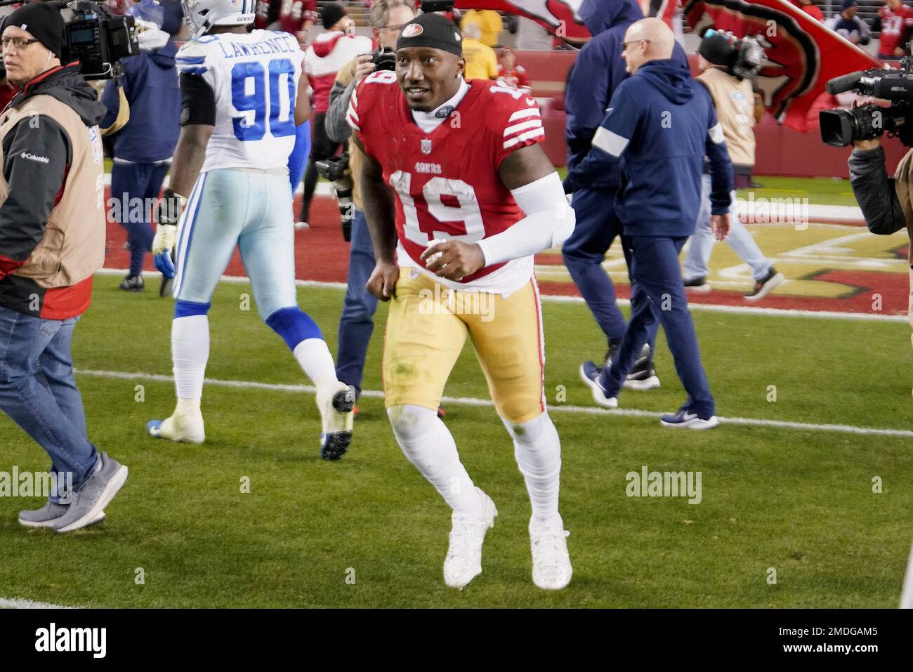 San Francisco 49ers wide receiver Deebo Samuel (19) runs off the field ... San Francisco 49ers wide receiver Deebo Samuel (19) runs off the field ...