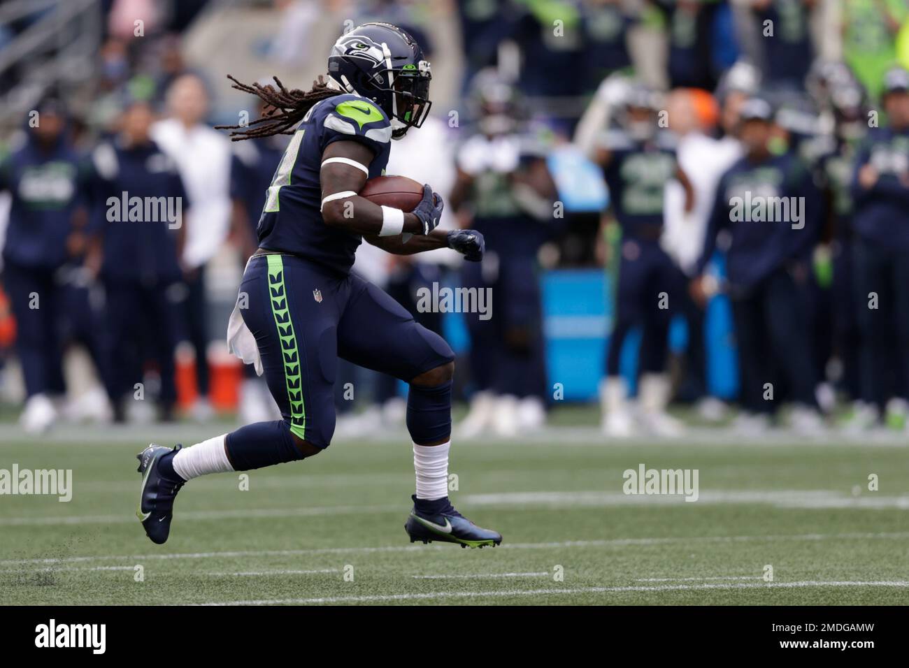Seattle Seahawks running back Alex Collins rushes during an NFL ...