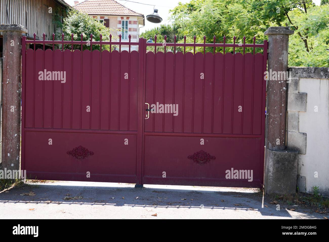 red steel home metal aluminum gate of house Stock Photo - Alamy