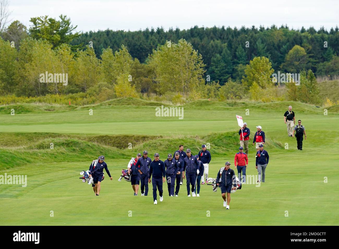 Team USA members walk up the fifth hole during a practice day at the Ryder Cup at the Whistling ...