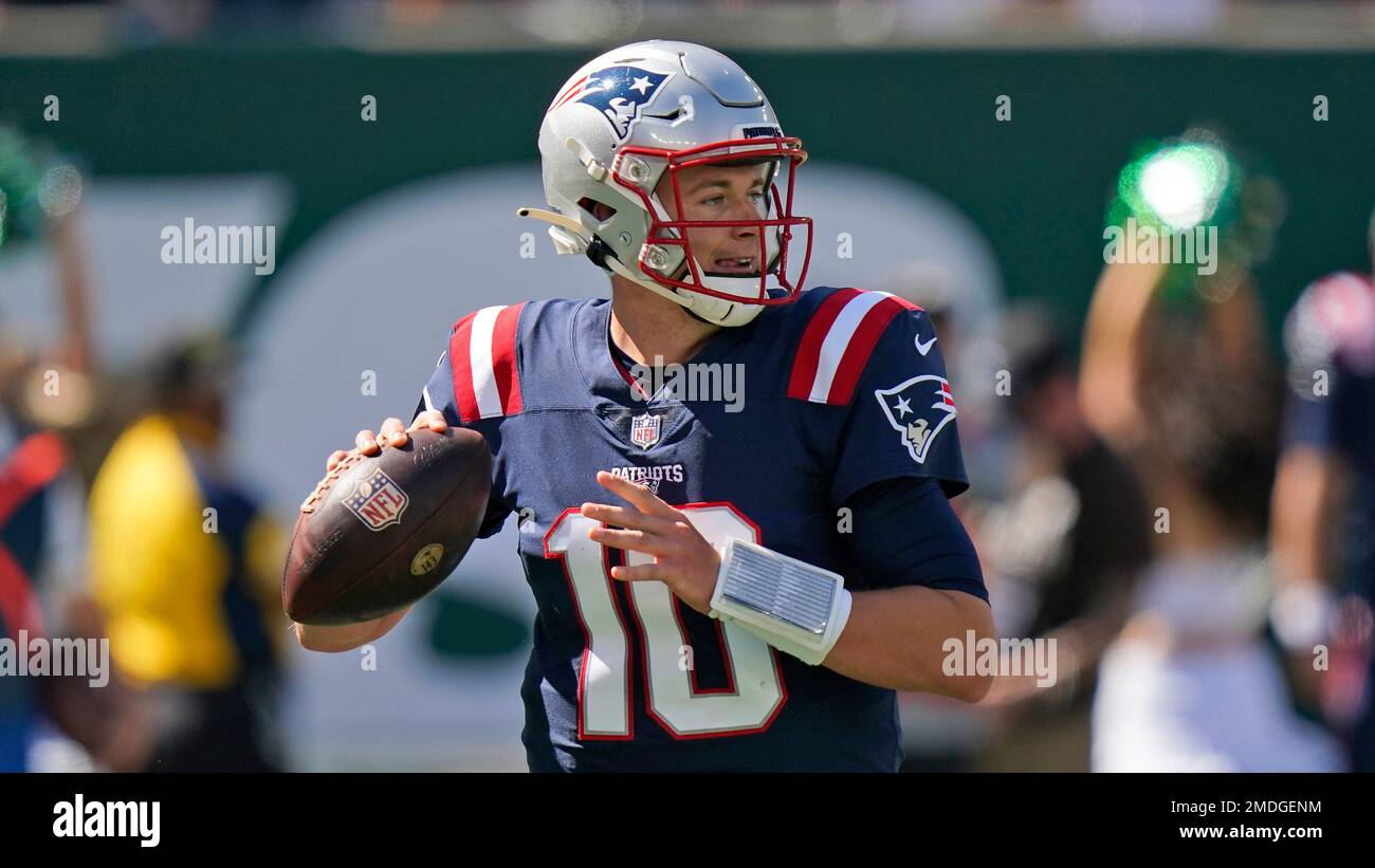 New England Patriots quarterback Mac Jones looks to throw during the ...