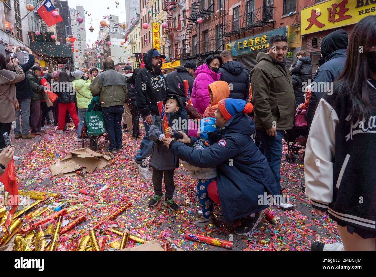NEW YORK, NEW YORK - JANUARY 22: Revelers pop confetti poppers during ...