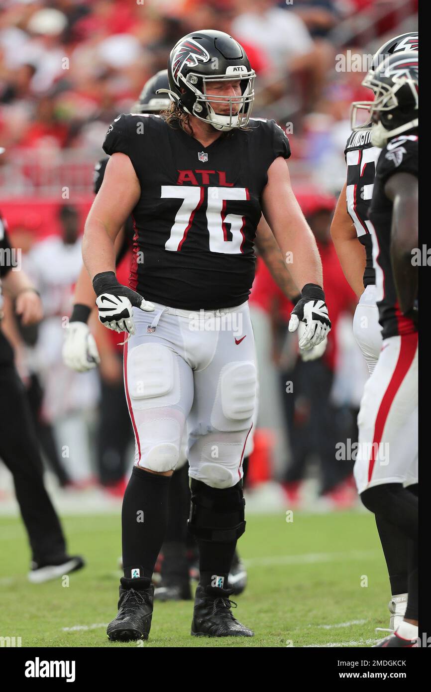 Atlanta Falcons offensive tackle Kaleb McGary (76) walks to the line ...