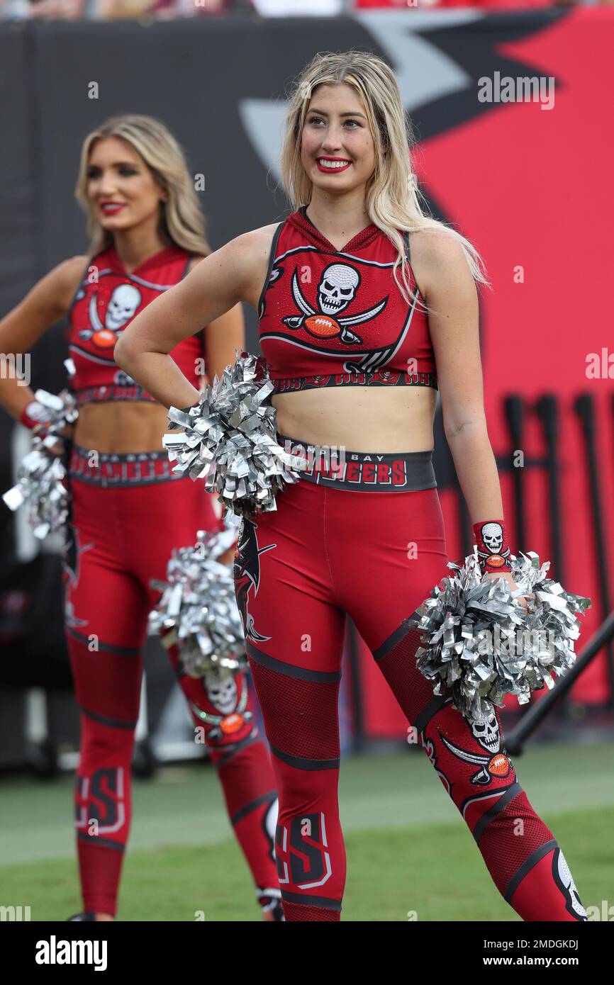 Tampa Bay Buccaneers cheerleaders watch the scoreboard against the ...