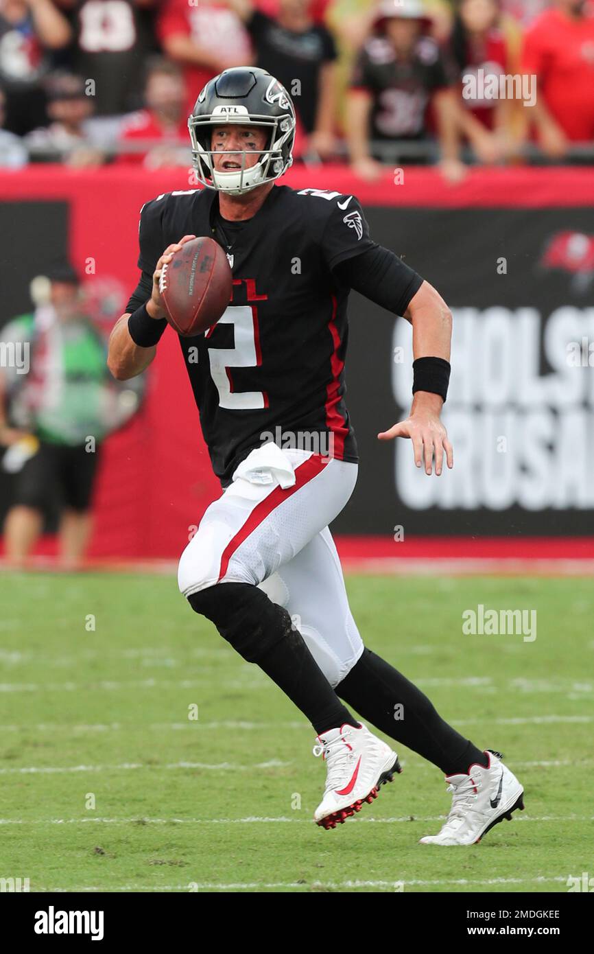 Atlanta Falcons quarterback Matt Ryan (2) runs with the ball against ...