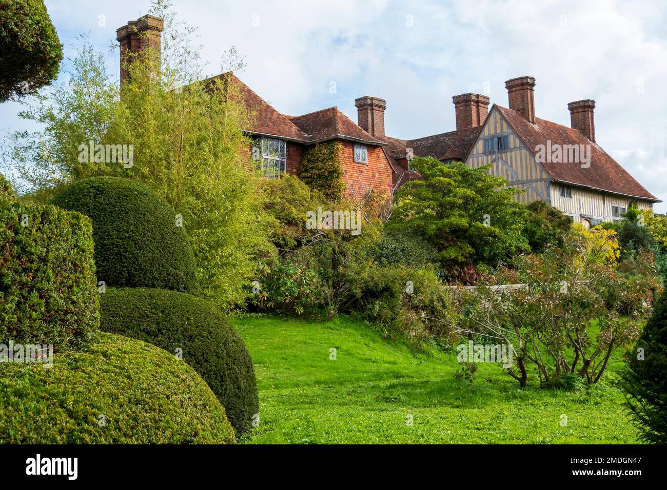 Great Dixter from the topiary garden, East Sussex, UK Stock Photo - Alamy