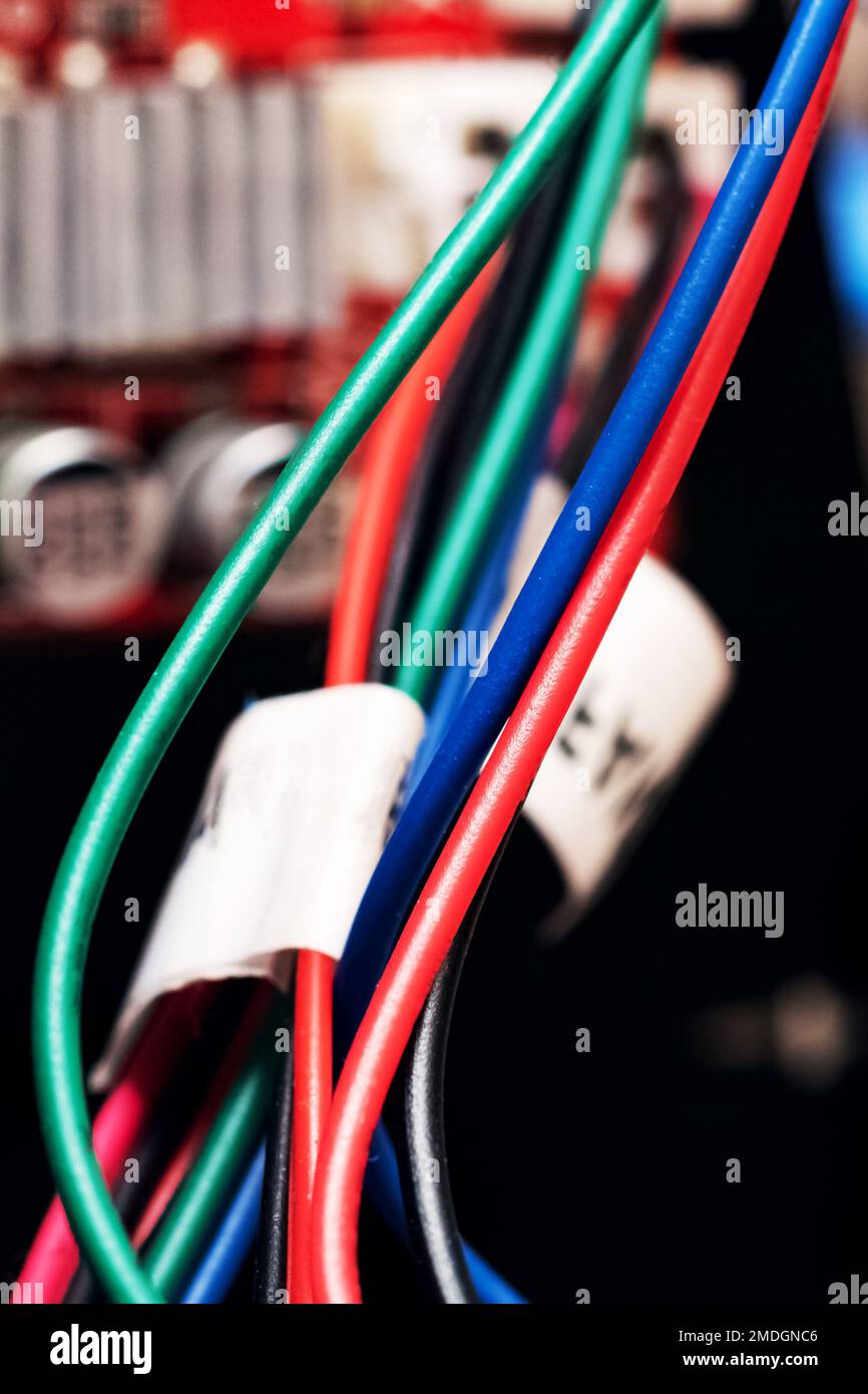 Multi colored wires on an electronic device, close up Stock Photo - Alamy