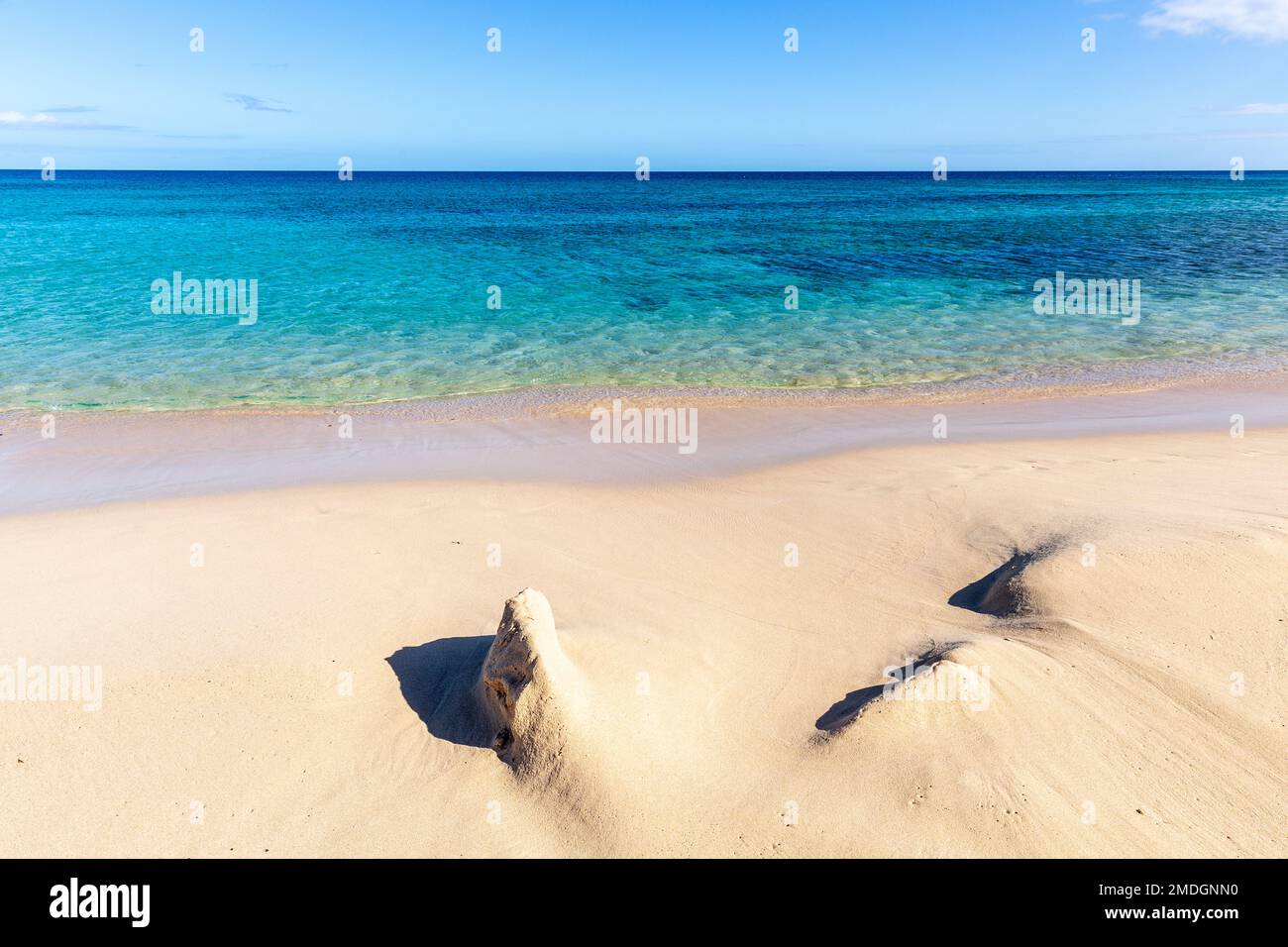 Sand sculpture completely eroded by the sea Stock Photo - Alamy
