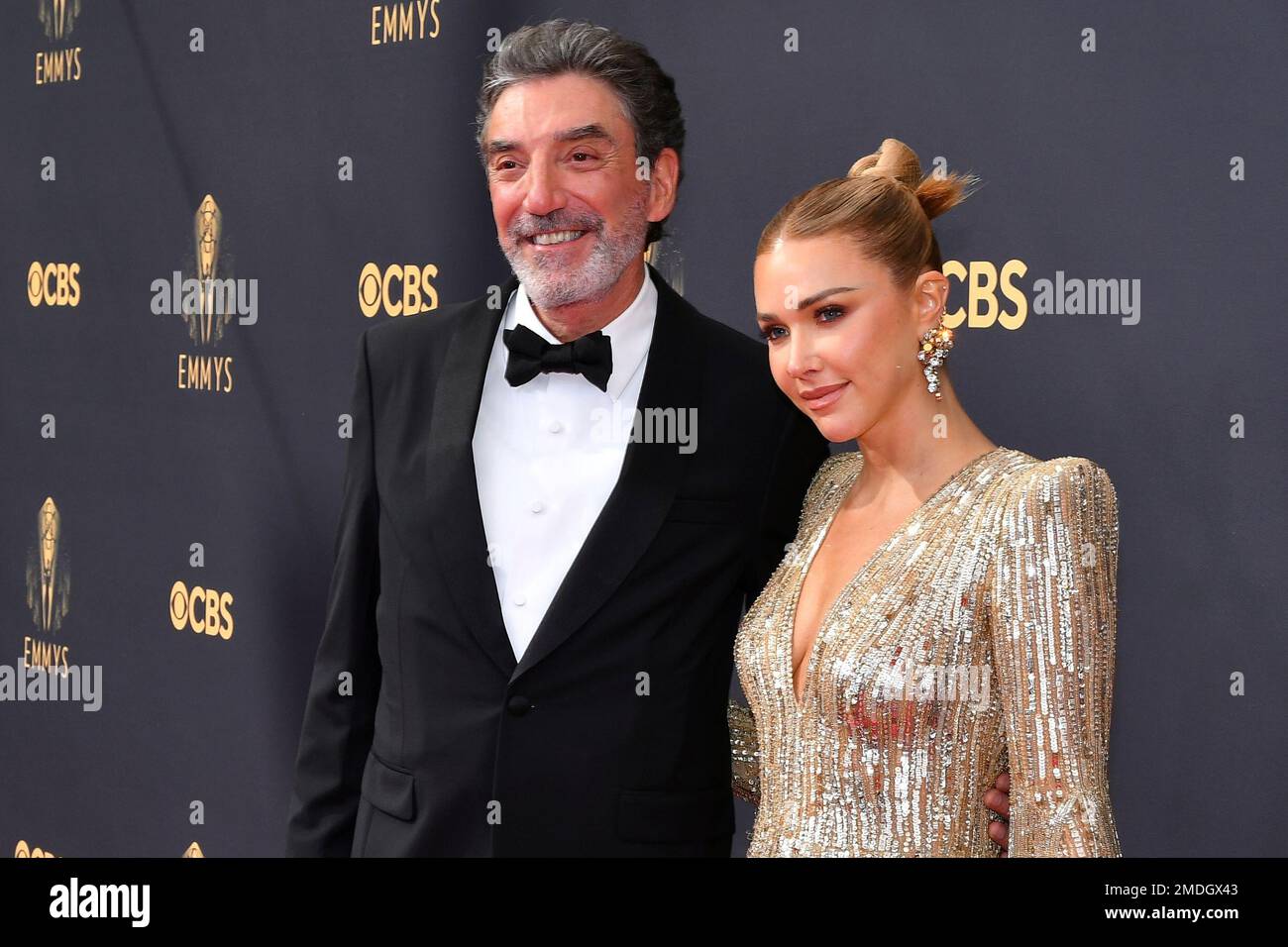 Chuck Lorre, left, and Arielle Lorre arrive at the 73rd Emmy Awards at ...