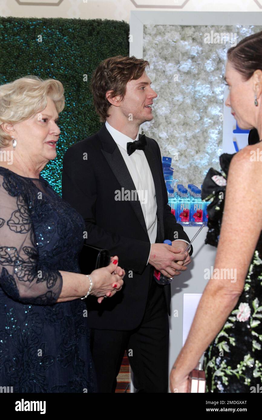 Julie Peters, from left, Evan Peters, and Julianne Nicholson arrive at ...