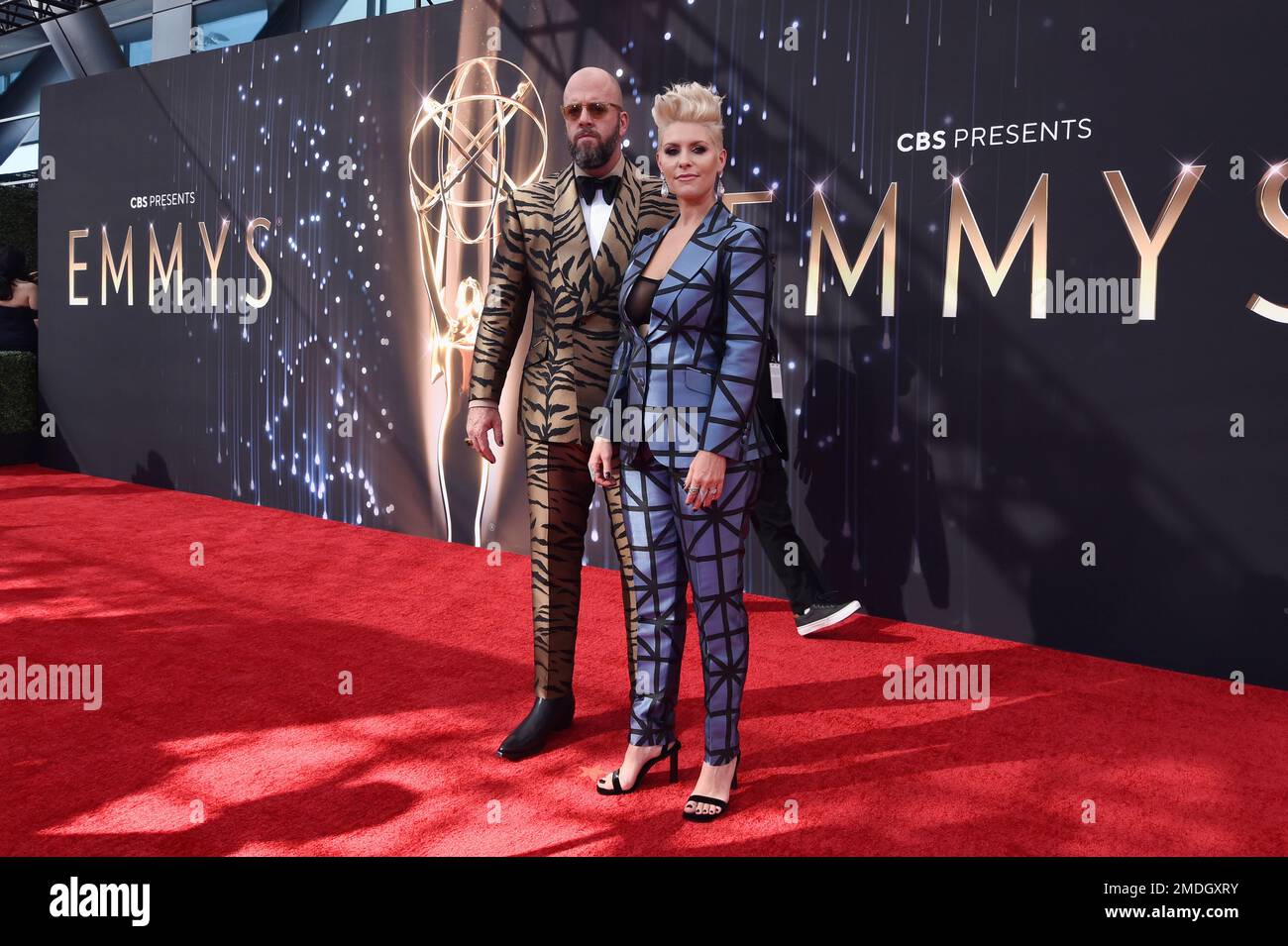 Chris Sullivan, left, and Rachel Reichard arrive at the 73rd Primetime ...