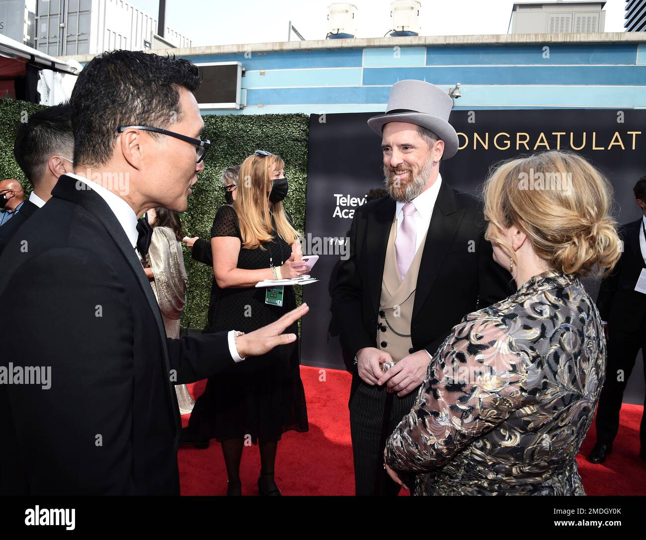 Daniel Dae Kim, from left, Brendan Hunt and Shannon Nelson arrive at ...