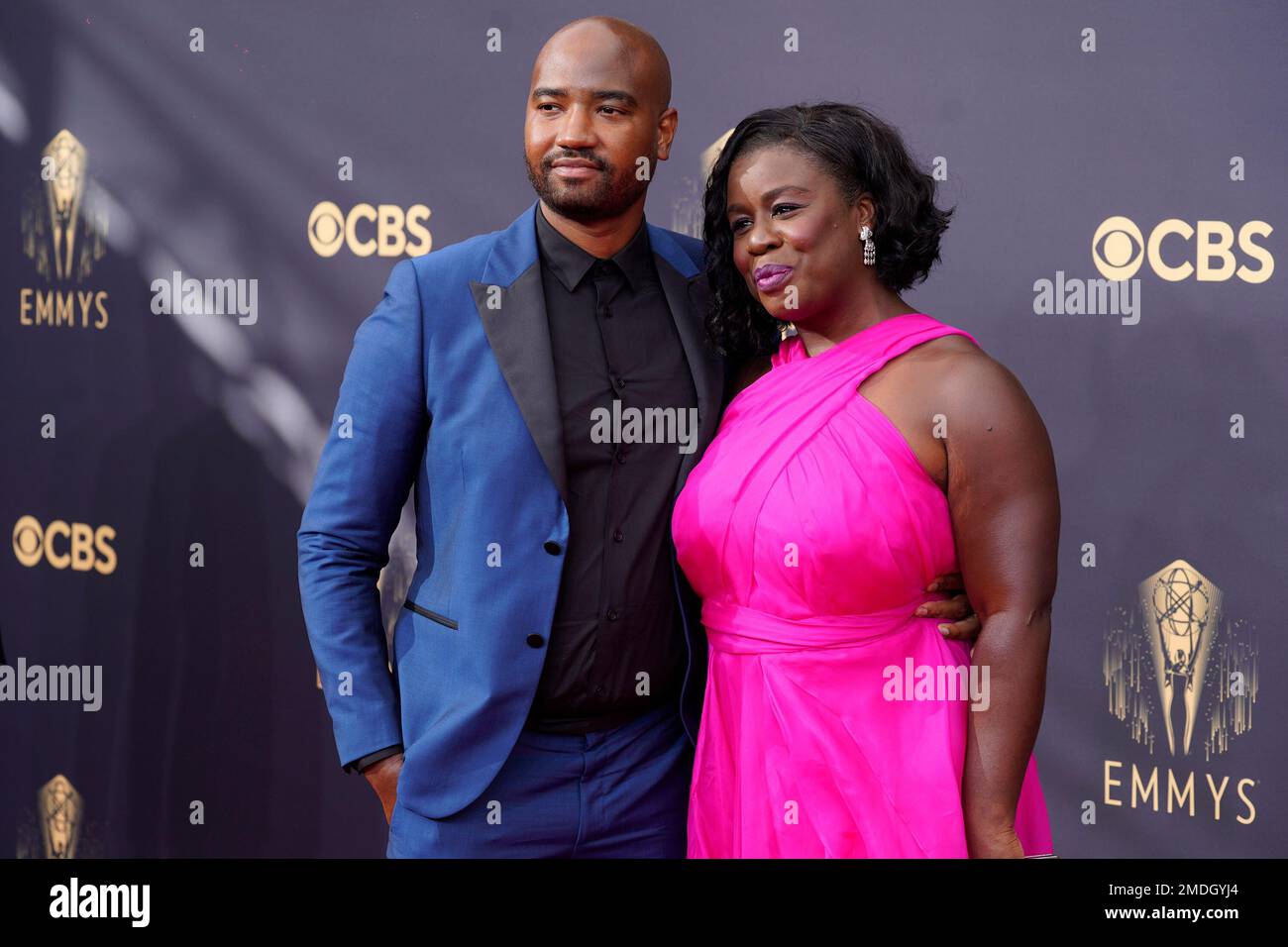 Robert Sweeting, left, and Uzo Aduba arrive at the 73rd Primetime Emmy ...