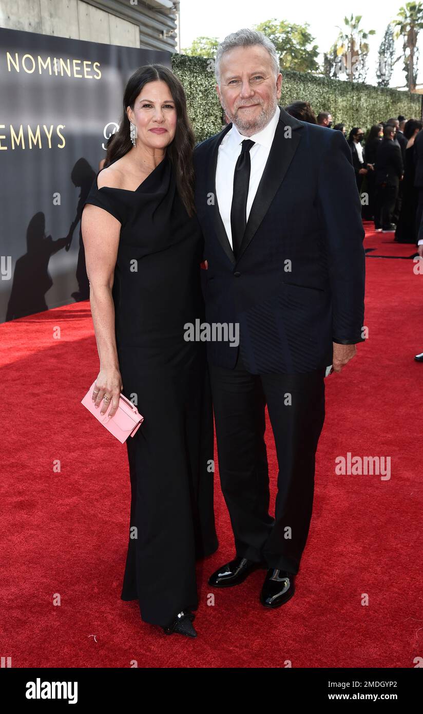 Paula Ravets, left and Paul Reiser arrive at the 73rd Emmy Awards at ...
