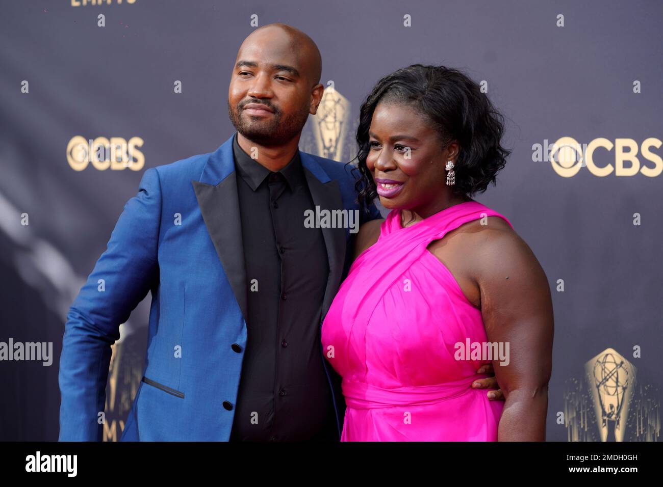 Robert Sweeting, left, and Uzo Aduba arrive at the 73rd Primetime Emmy ...