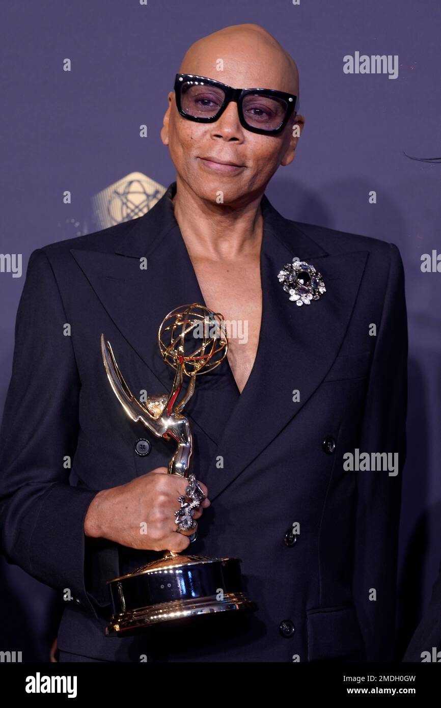 RuPaul Charles poses with the award for outstanding competition program ...