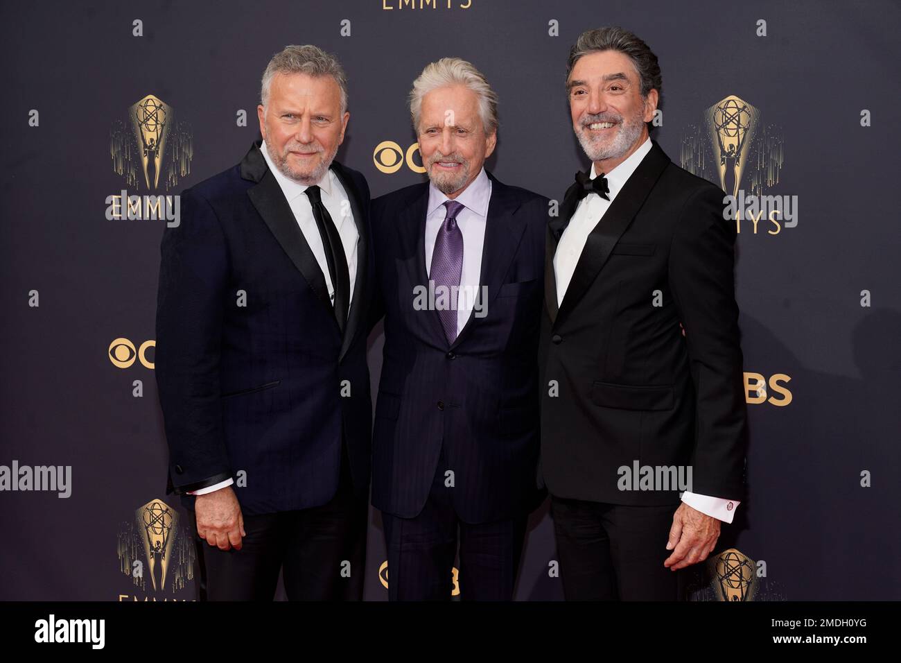 Paul Reiser, from left, Michael Douglas, and Chuck Lorre arrive at the ...