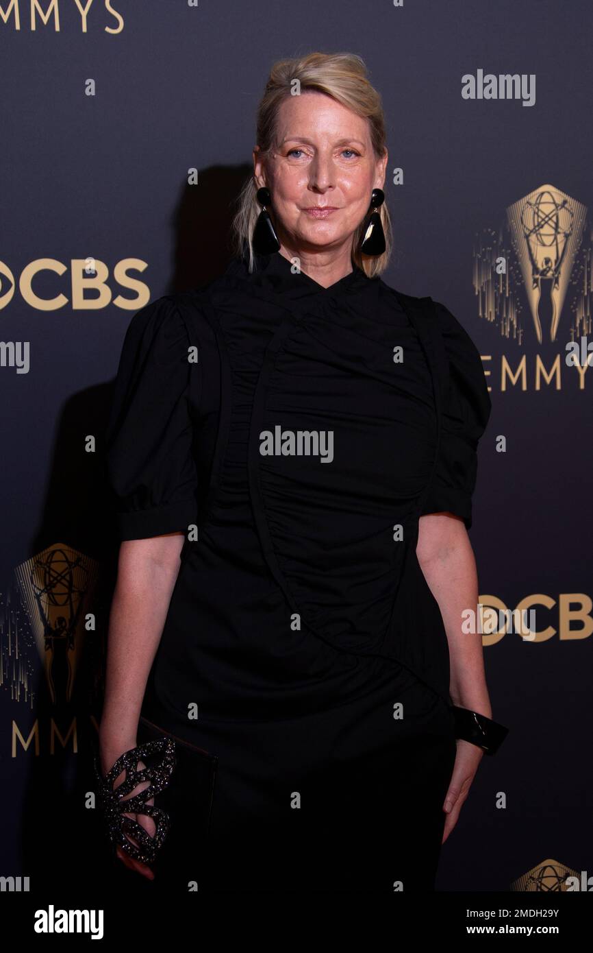 Suzanne Mackie poses for photographers as they arrive for the Netflix ...